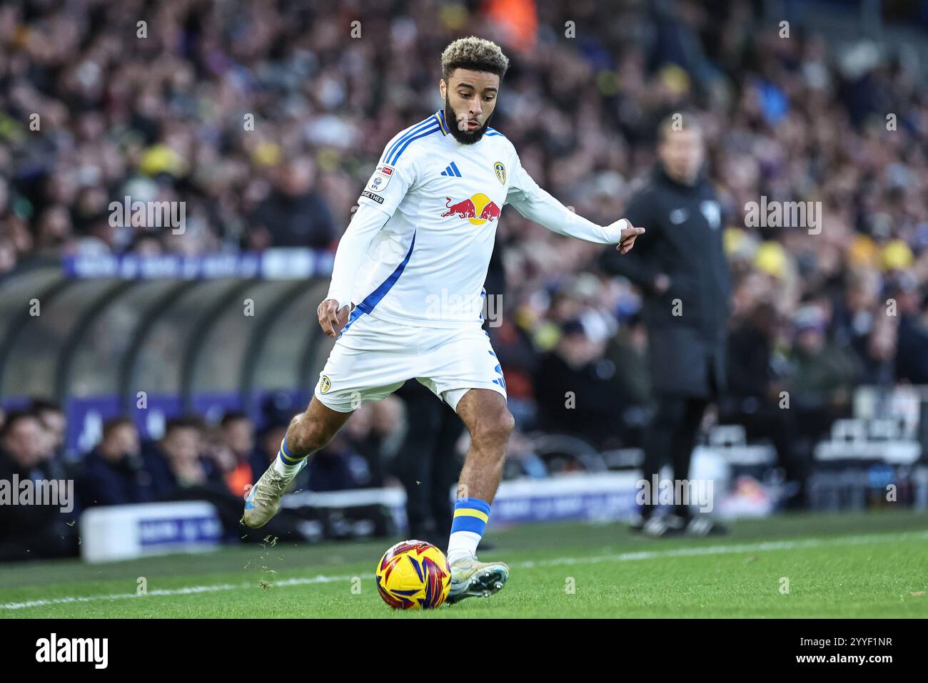 Leeds, UK. 21st Dec, 2024. Jayden Bogle of Leeds United crosses the ...