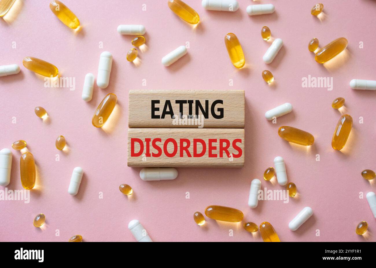 Eating Disorders symbol. Concept word. Eating Disorders on wooden ...