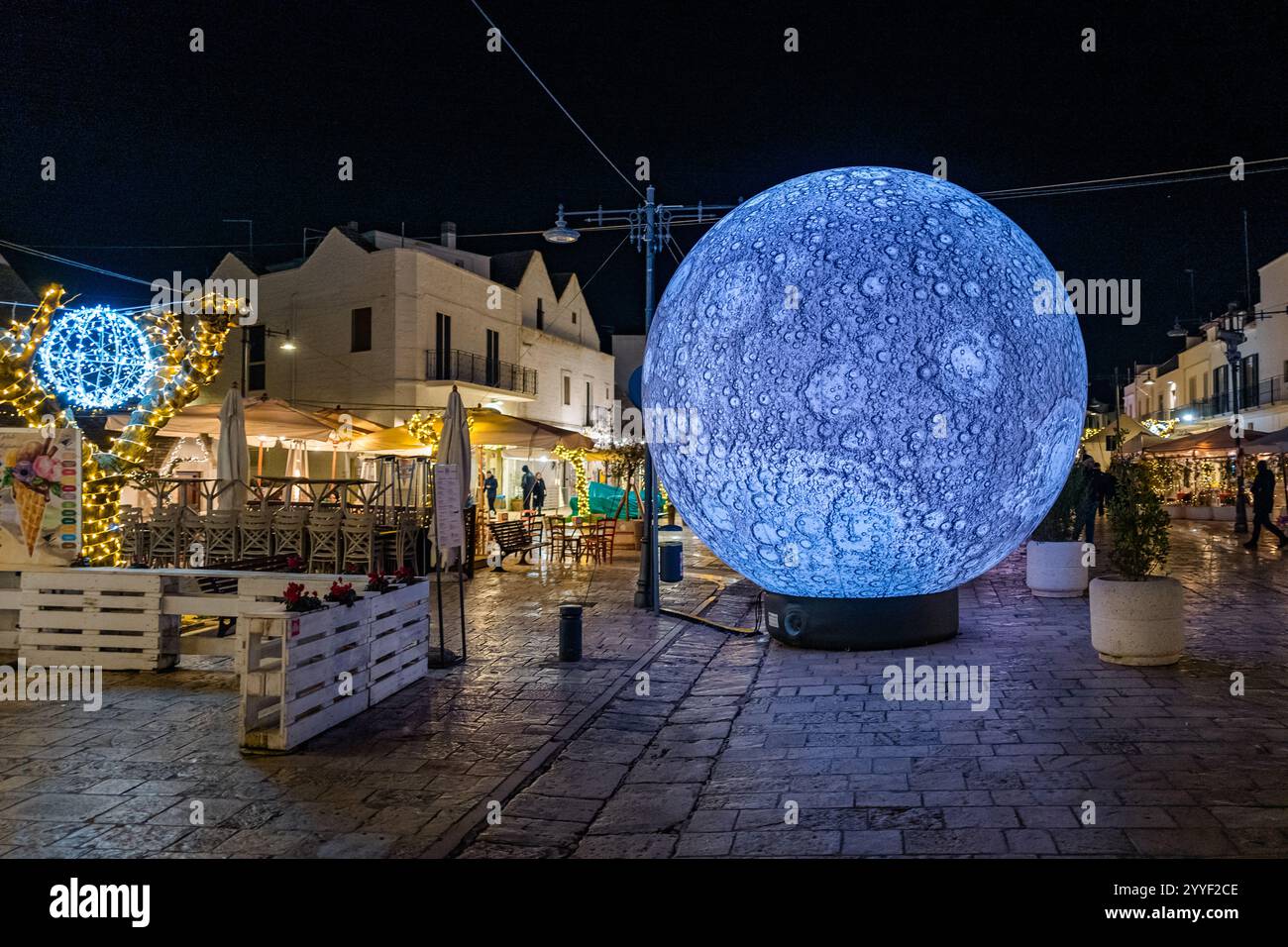 Lights and light projections illuminate the trulli of Alberobello ...