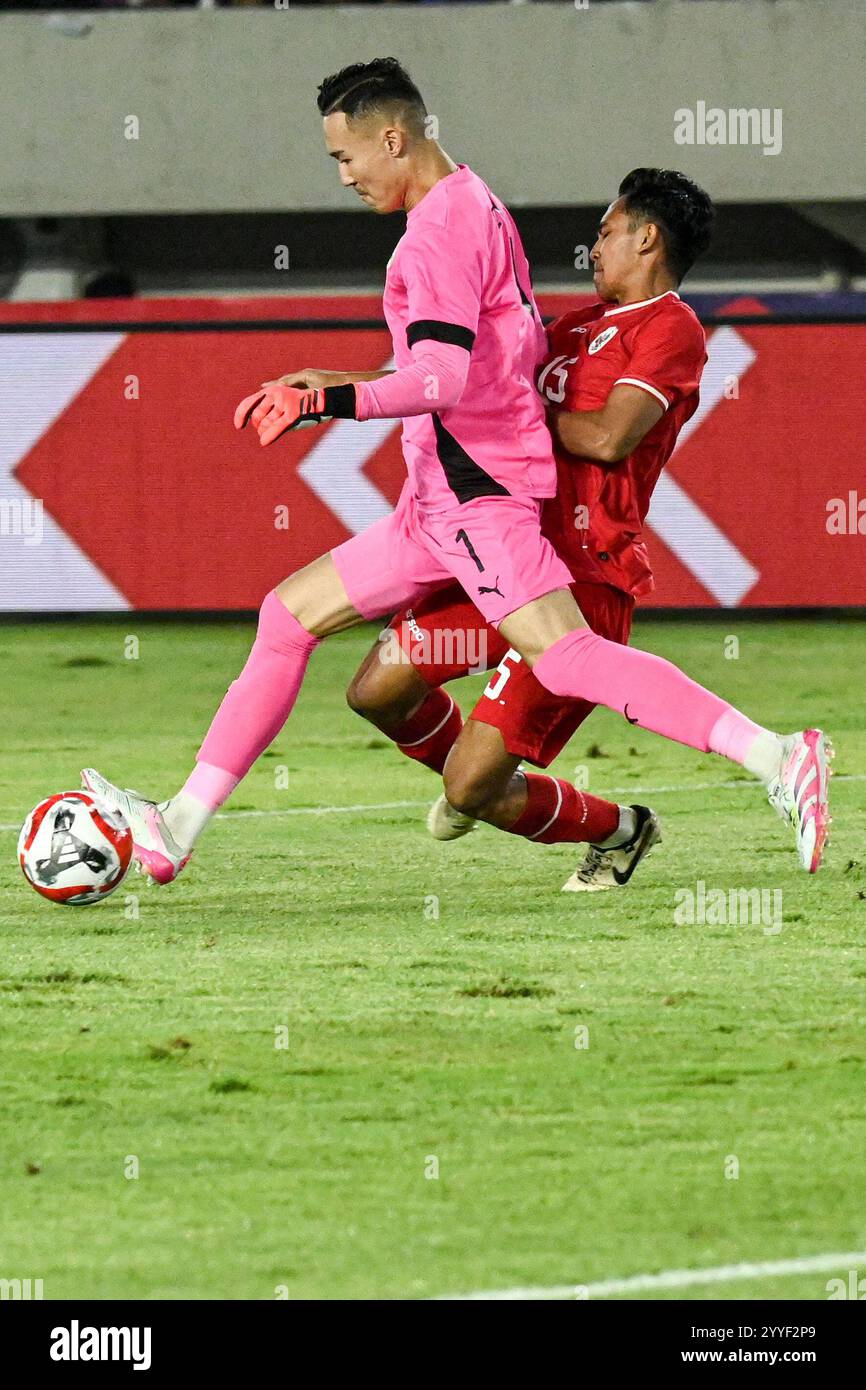 Surakarta, Indonesia. 21st Dec, 2024. Muhammad Rayhan Hannan (R) of ...