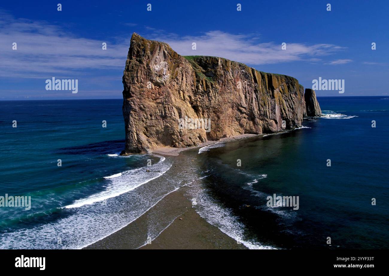 Percé Rock is a huge sheer rock formation in the Gulf of Saint Lawrence ...
