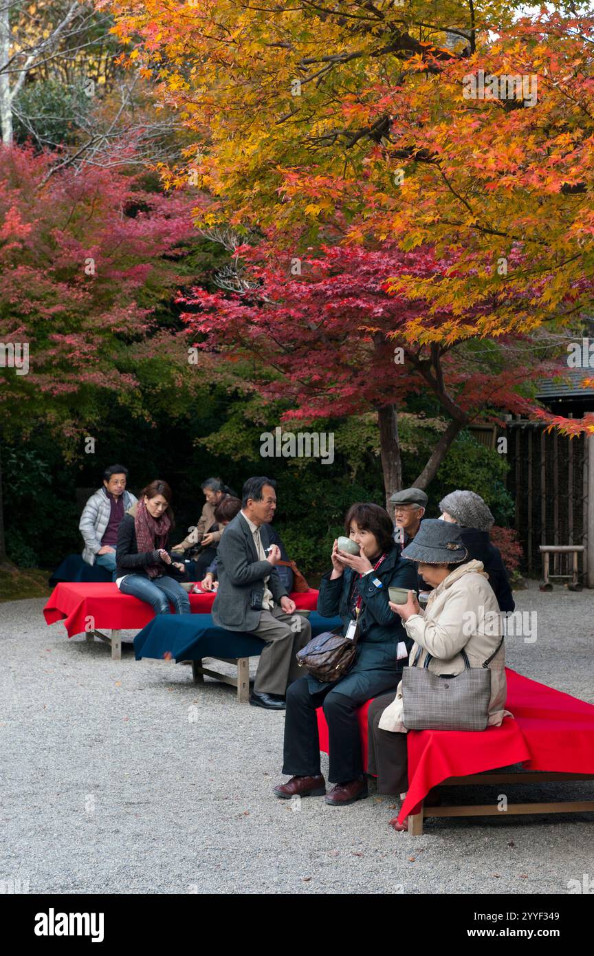 Visitors to Okochi Sanso Villa in Sagano Arashiyama, Kyoto relaxing ...