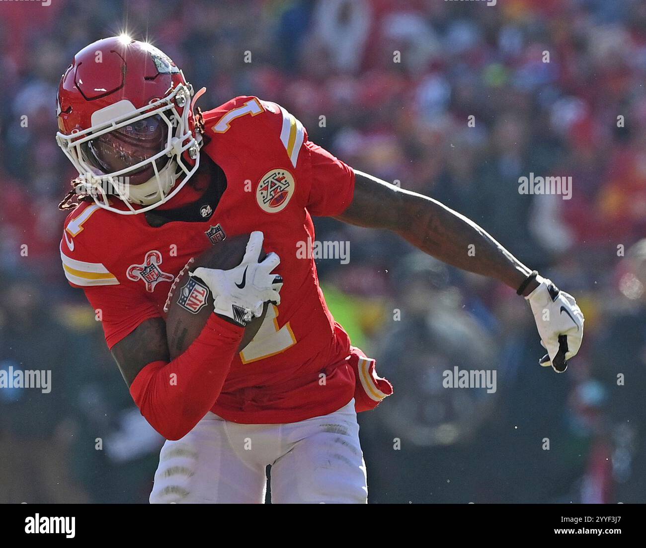 Kansas City Chiefs wide receiver Xavier Worthy (1) runs with the ball ...