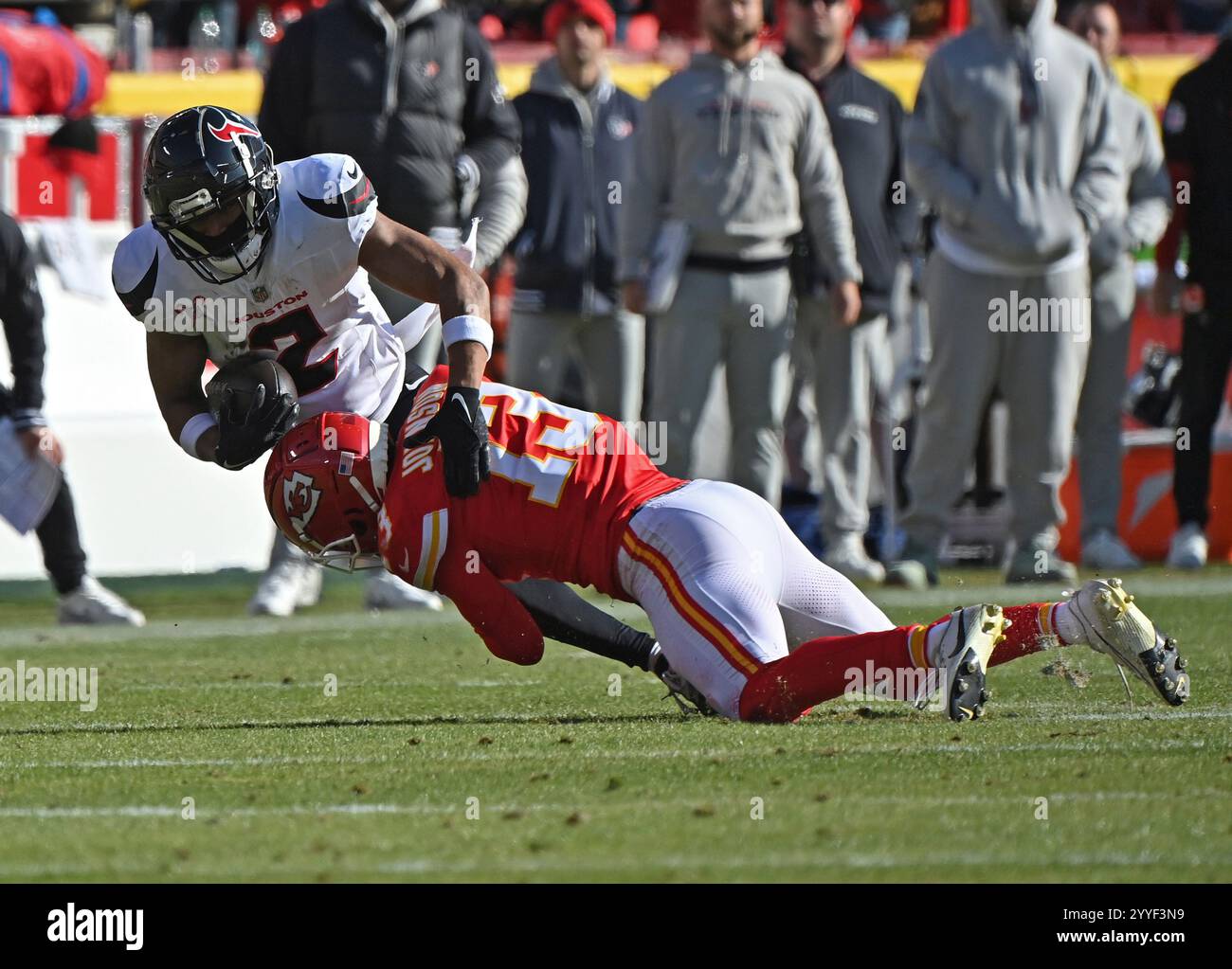 Kansas City Chiefs safety Nazeeh Johnson (13) tackles Houston Texans ...