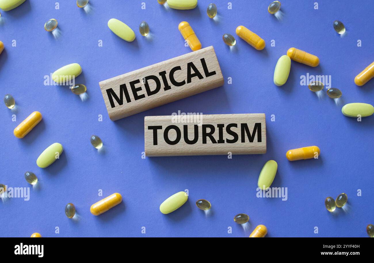 Medical Tourism symbol. Concept word Medical Tourism on wooden blocks ...