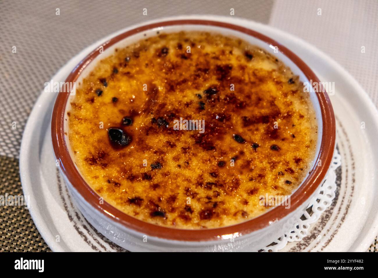 Creme Brulee, also known as burnt cream, a dessert with rich custard ...