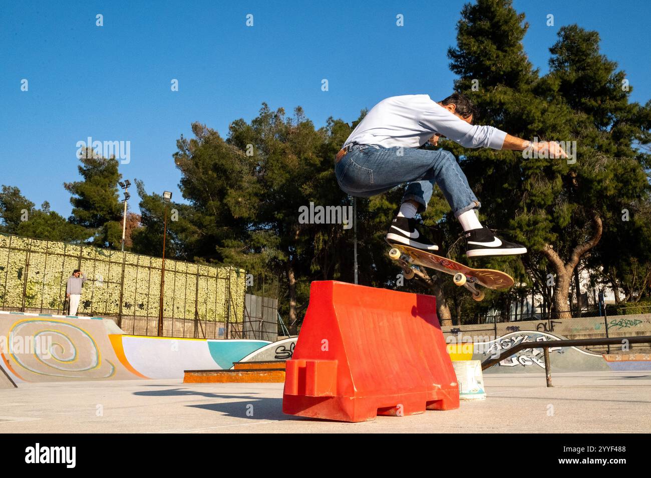 Young Greek boy practise skateboard at the Veikou Grove Do-It-Yourself ...