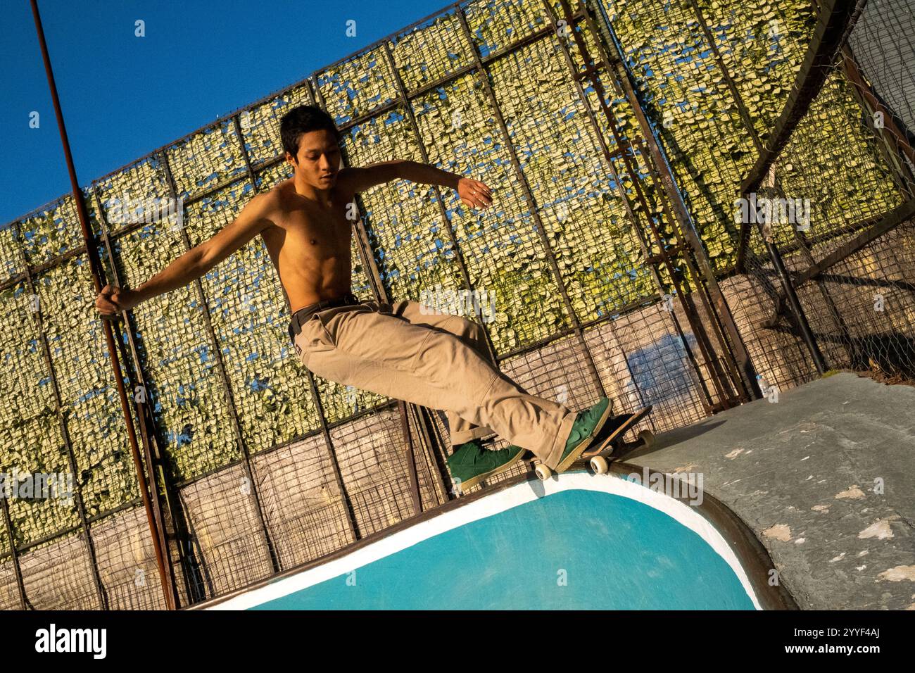 Young Greek boy practise skateboard at the Veikou Grove Do-It-Yourself ...