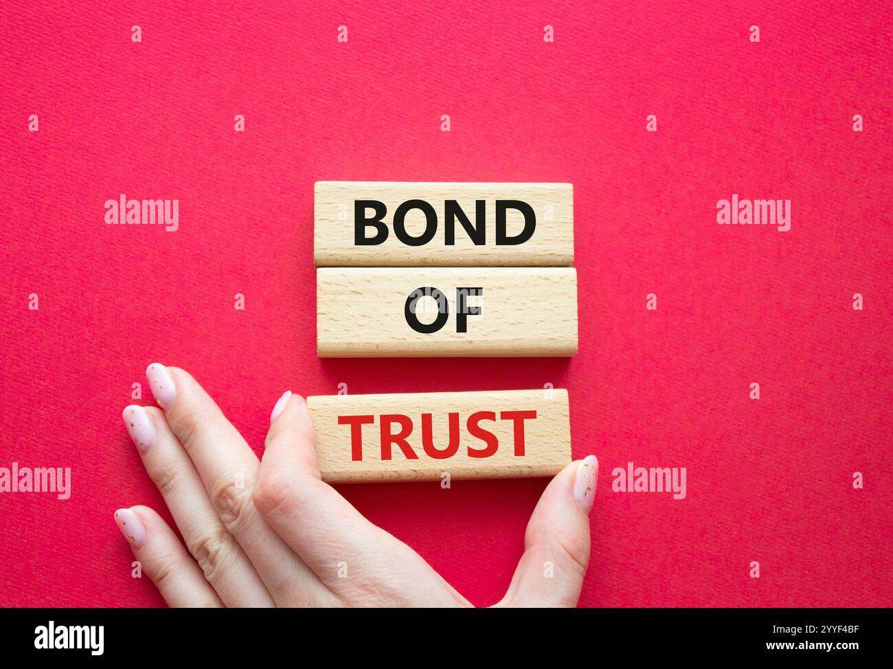 Bond of trust symbol. Wooden blocks with words Bond of trust. Beautiful ...