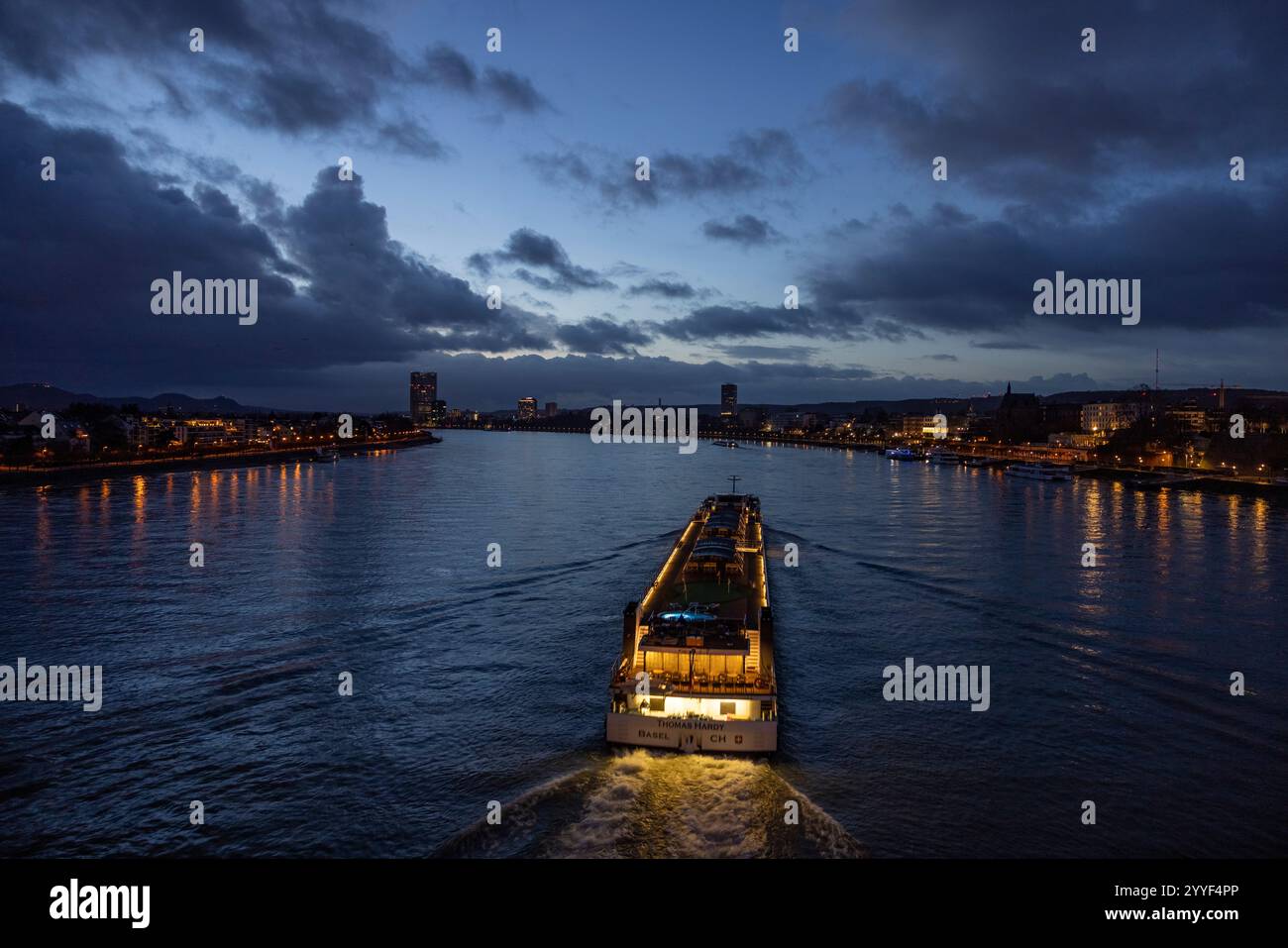22 December 2024, North Rhine-Westphalia, Bonn: A river cruise ship is ...