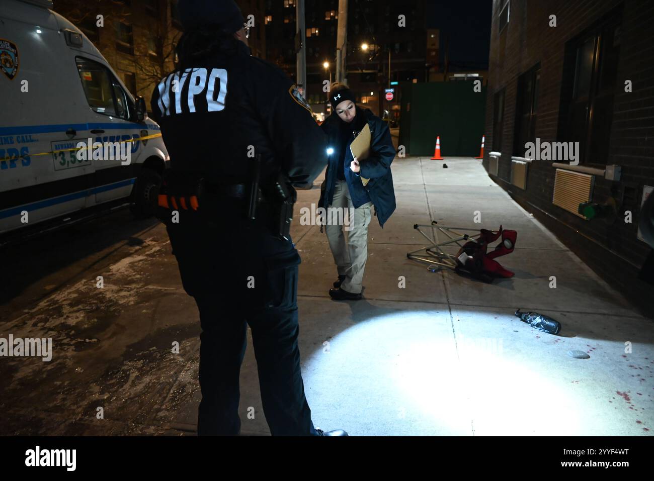 NYPD crime scene investigators find a chair, blood and other objects ...