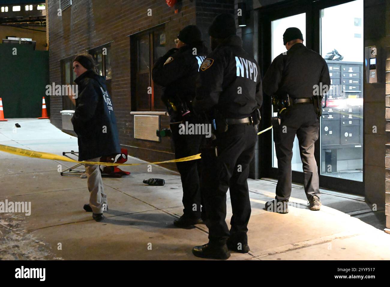 NYPD crime scene investigators find a chair, blood and other objects ...