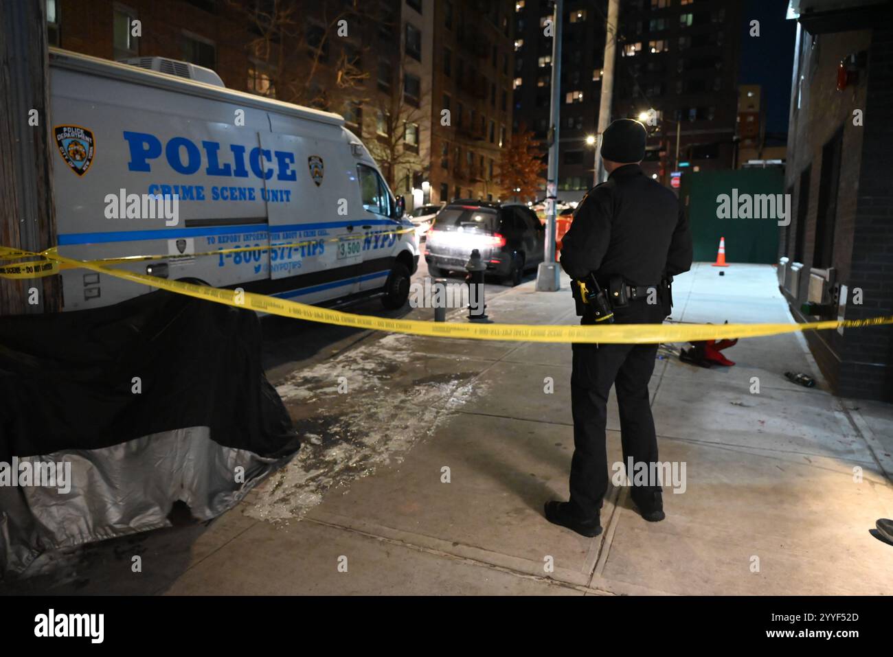 NYPD crime scene investigators find a chair, blood and other objects ...