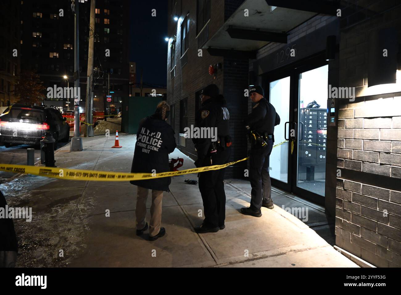 NYPD crime scene investigators find a chair, blood and other objects ...