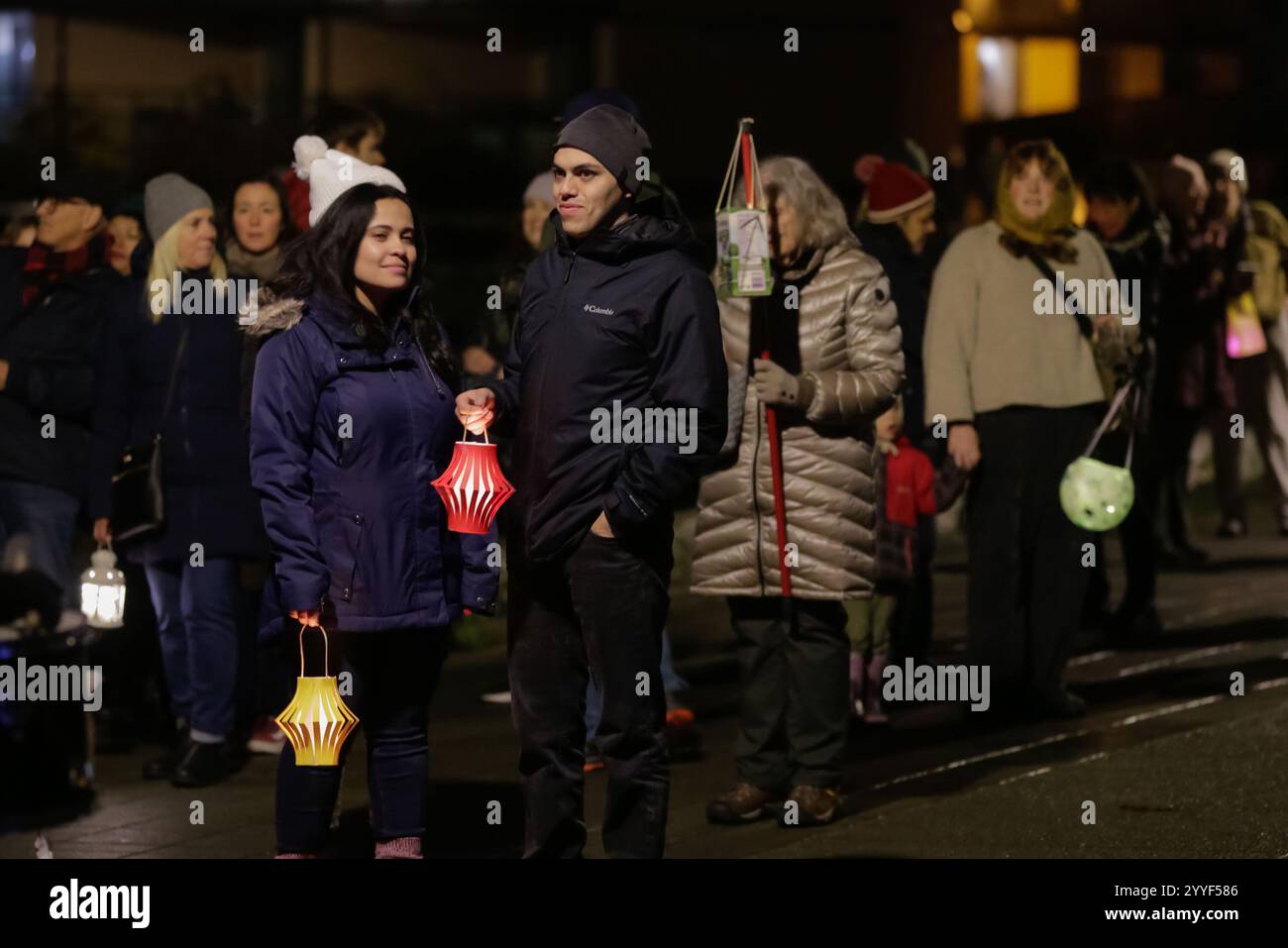 Vancouver, Canada. 21st Dec, 2024. People holding home-made lanterns take part in a procession ...