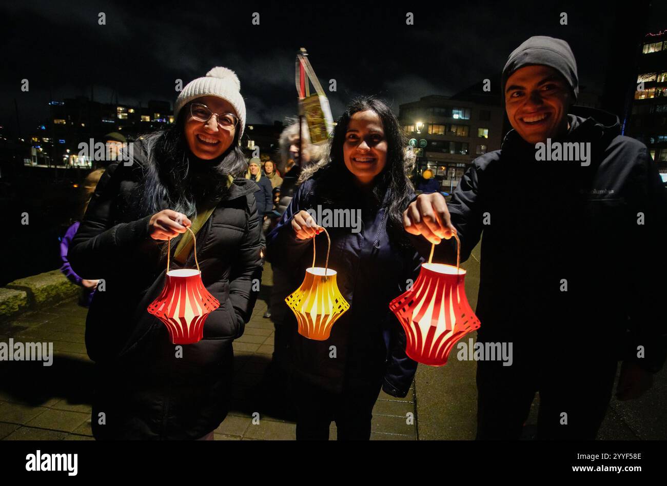 Vancouver, Canada. 21st Dec, 2024. People holding home-made lanterns take part in a procession ...