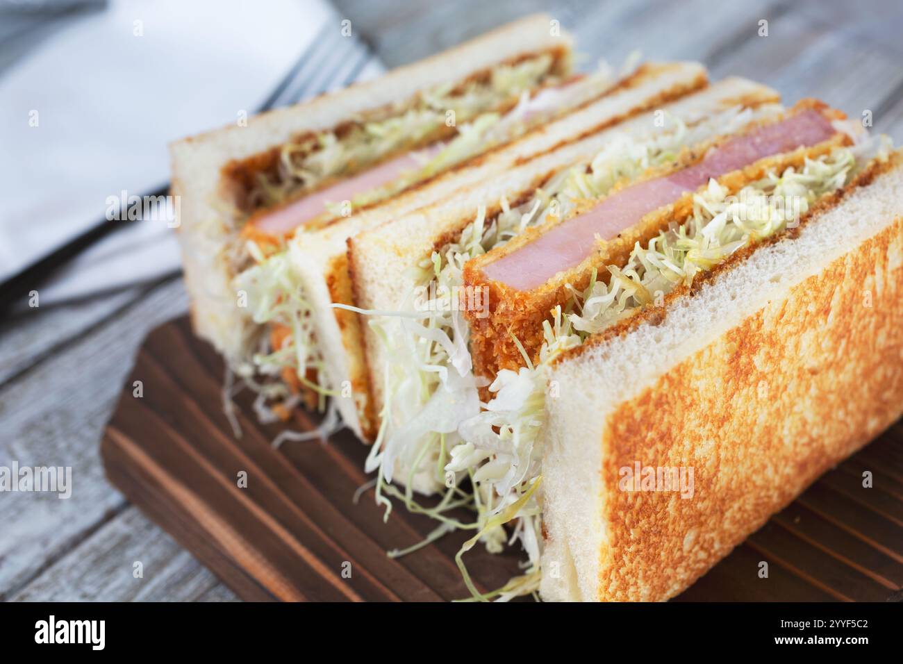 A closeup view of a Japanese Katsu Ham Sando Stock Photo - Alamy