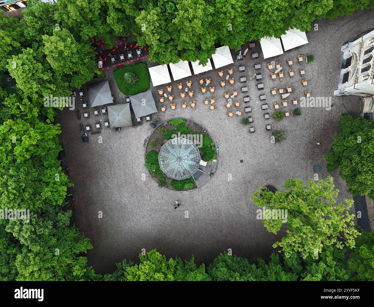 Aerial top down view of a small town square with coffee tables Stock ...