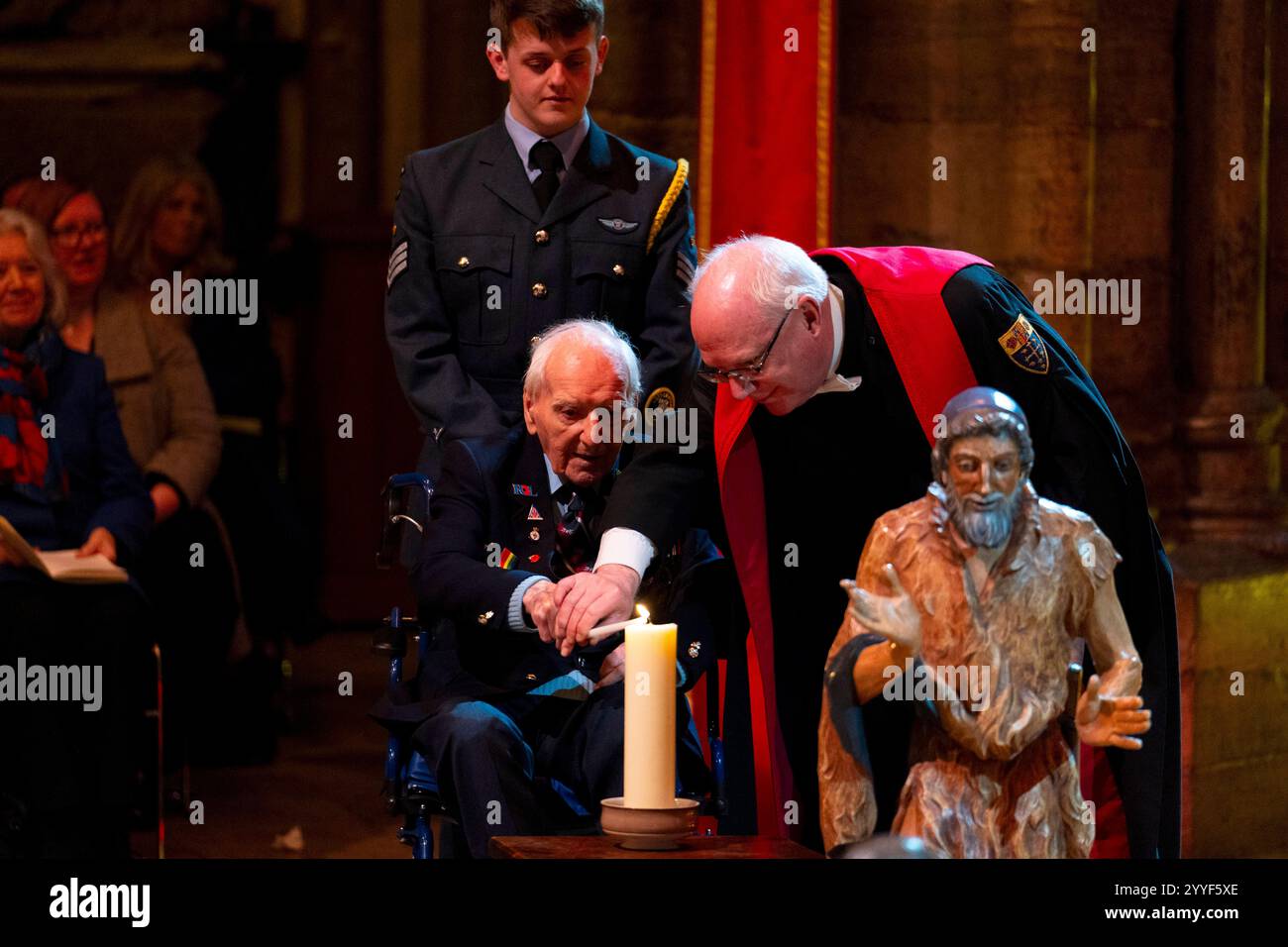 D-Day veteran Bernard Morgan lights a candle during the Together At ...