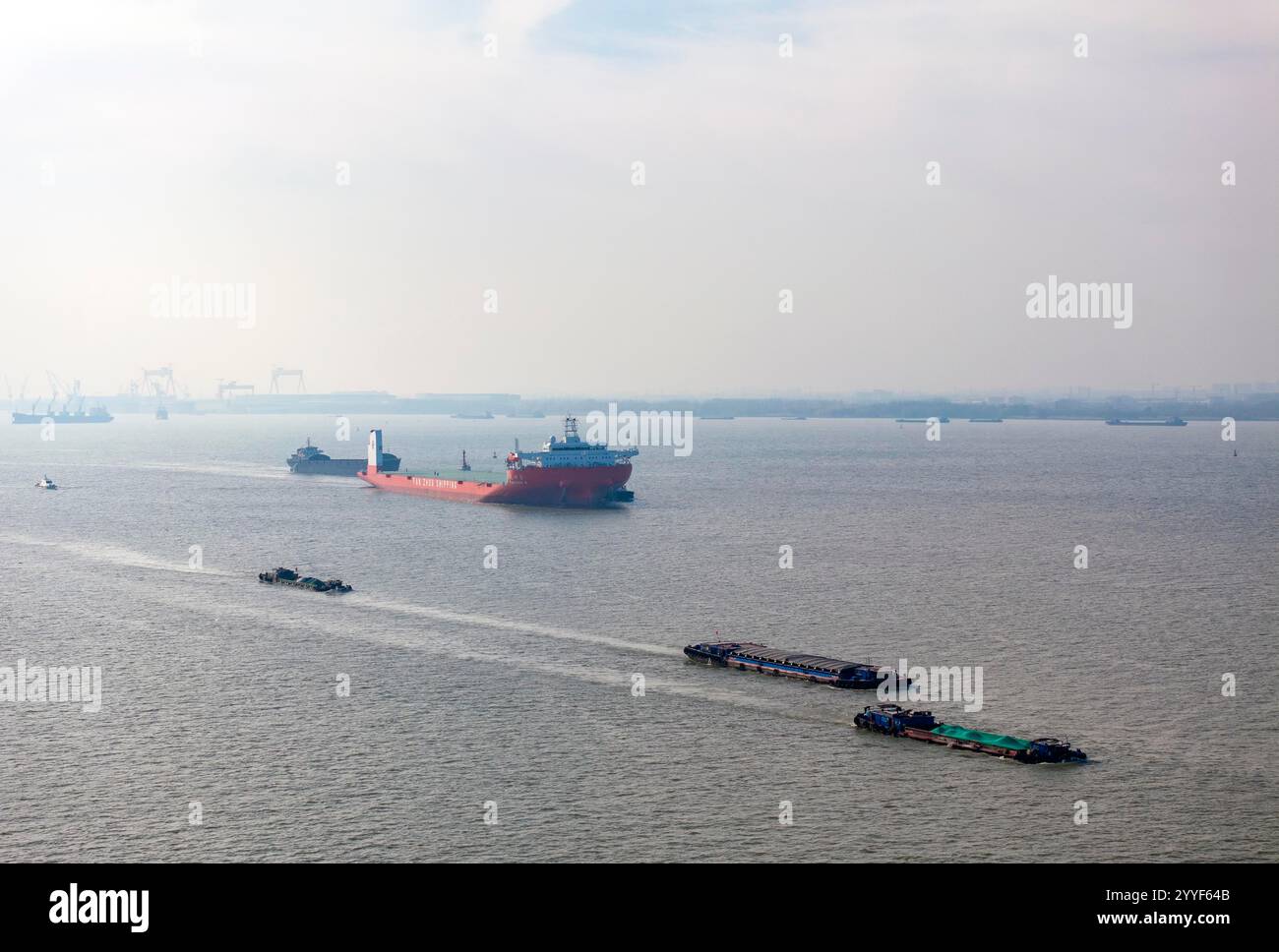 TAIZHOU, CHINA - DECEMBER 22, 2024 - A self-propelled deck ship with ...