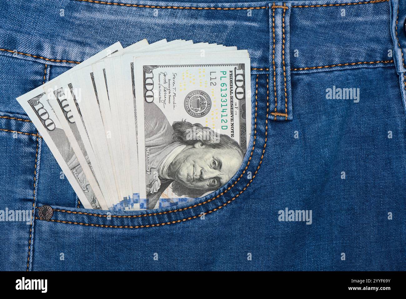 100 dollars in jeans hi-res stock photography and images - Alamy