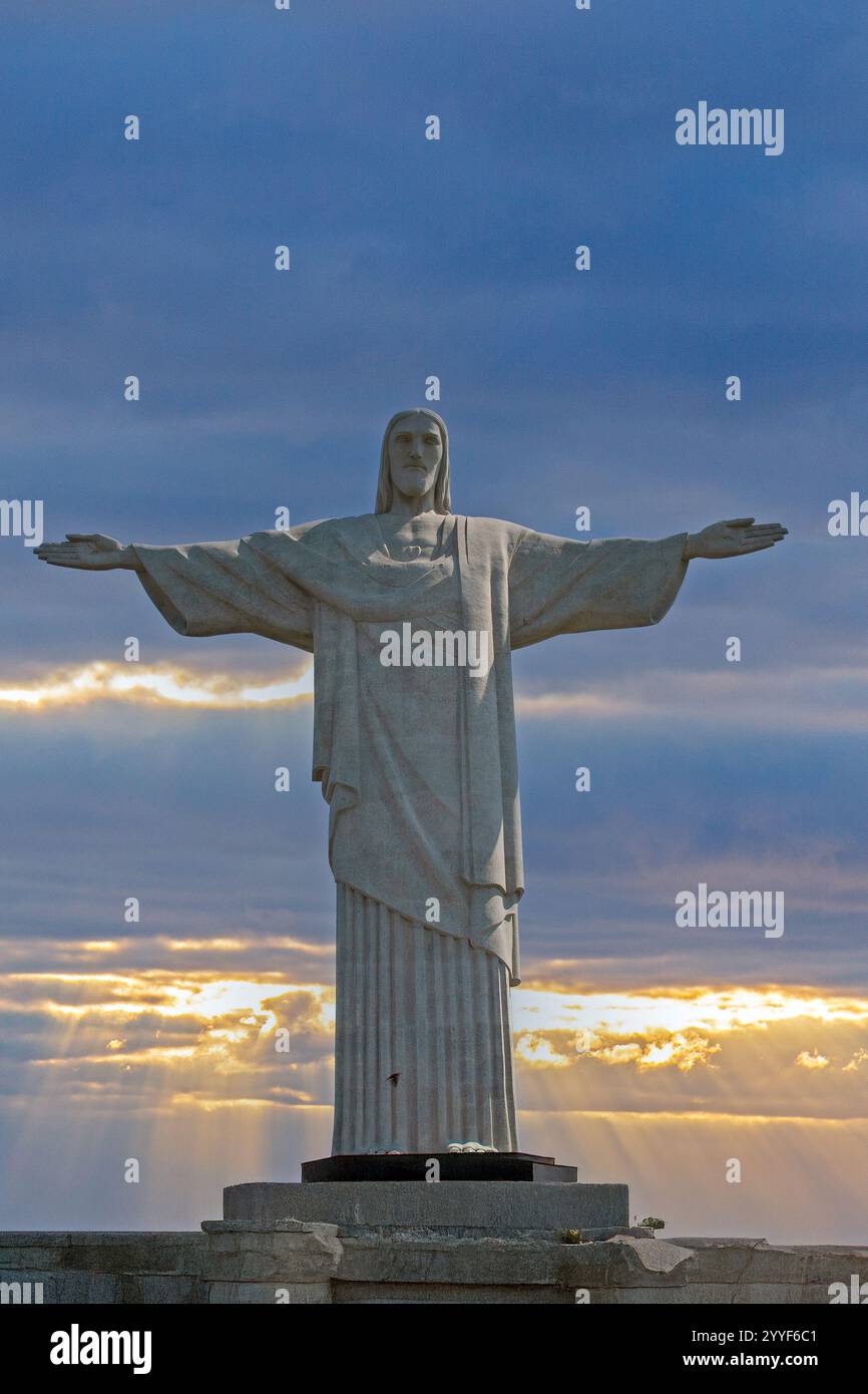 Majestic Christ the Redeemer statue in Rio de Janeiro with dramatic sky ...