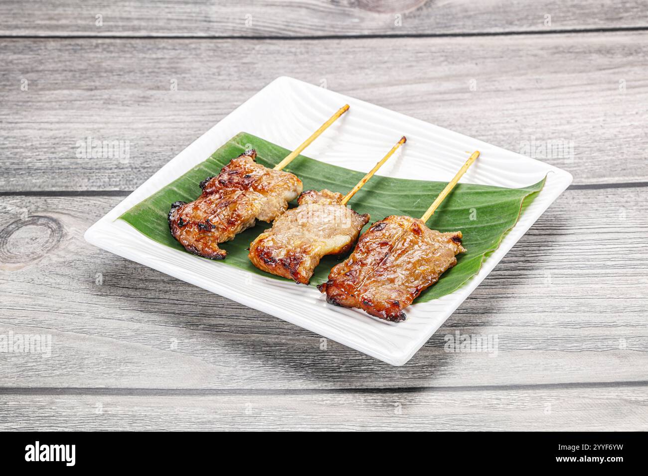 Thai traditional cuisine - grilled pork skewer Stock Photo - Alamy
