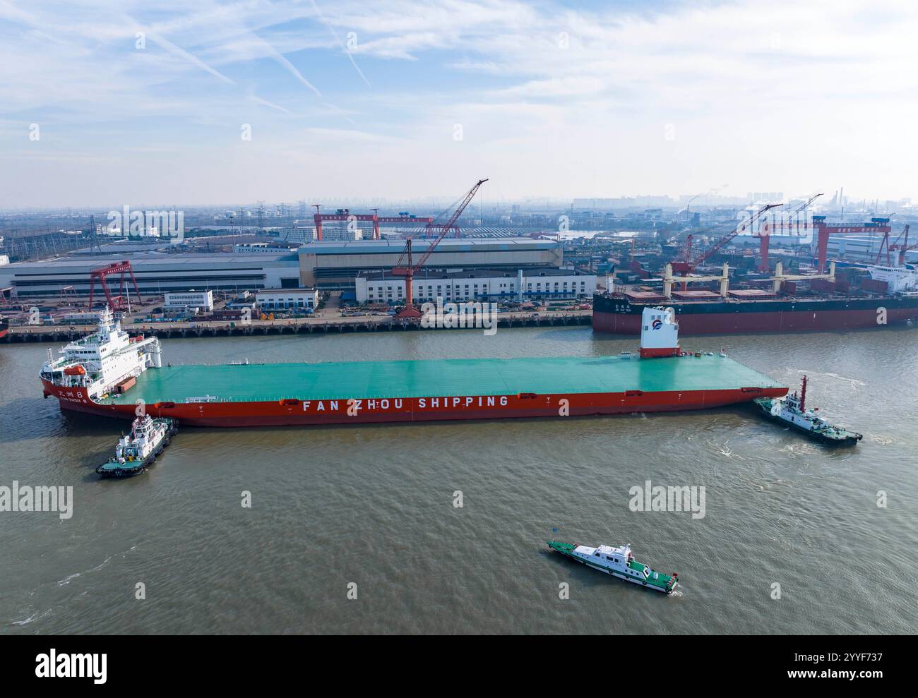 TAIZHOU, CHINA - DECEMBER 22, 2024 - A self-propelled deck ship with ...