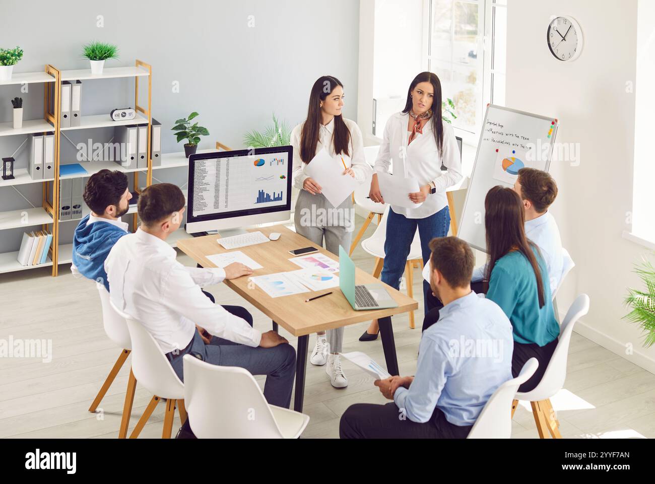 Female business coach, lady speakers in office gives presentation ...