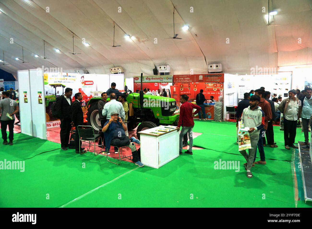 Rajkot, Gujarat, India. 21th December, 2024. Day 2 of Agri World Expo 2024, Maruti tractor with ...
