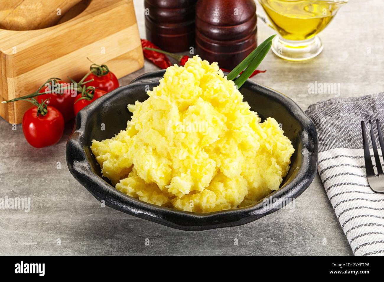 Mashed potato Puree with butter served green onion Stock Photo - Alamy