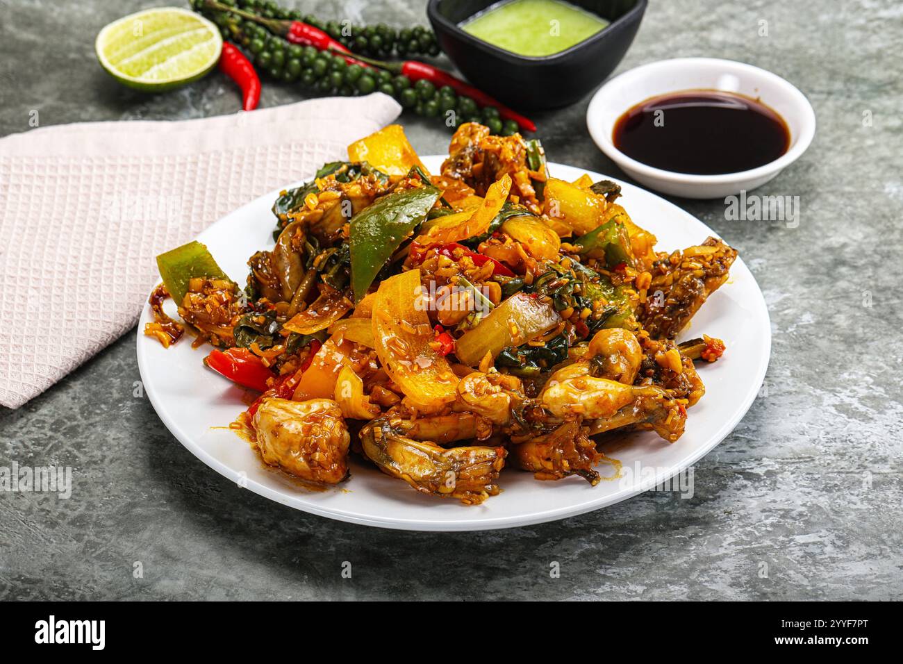 Vietnamese cuisine - fried frog with vegetables and spices Stock Photo ...