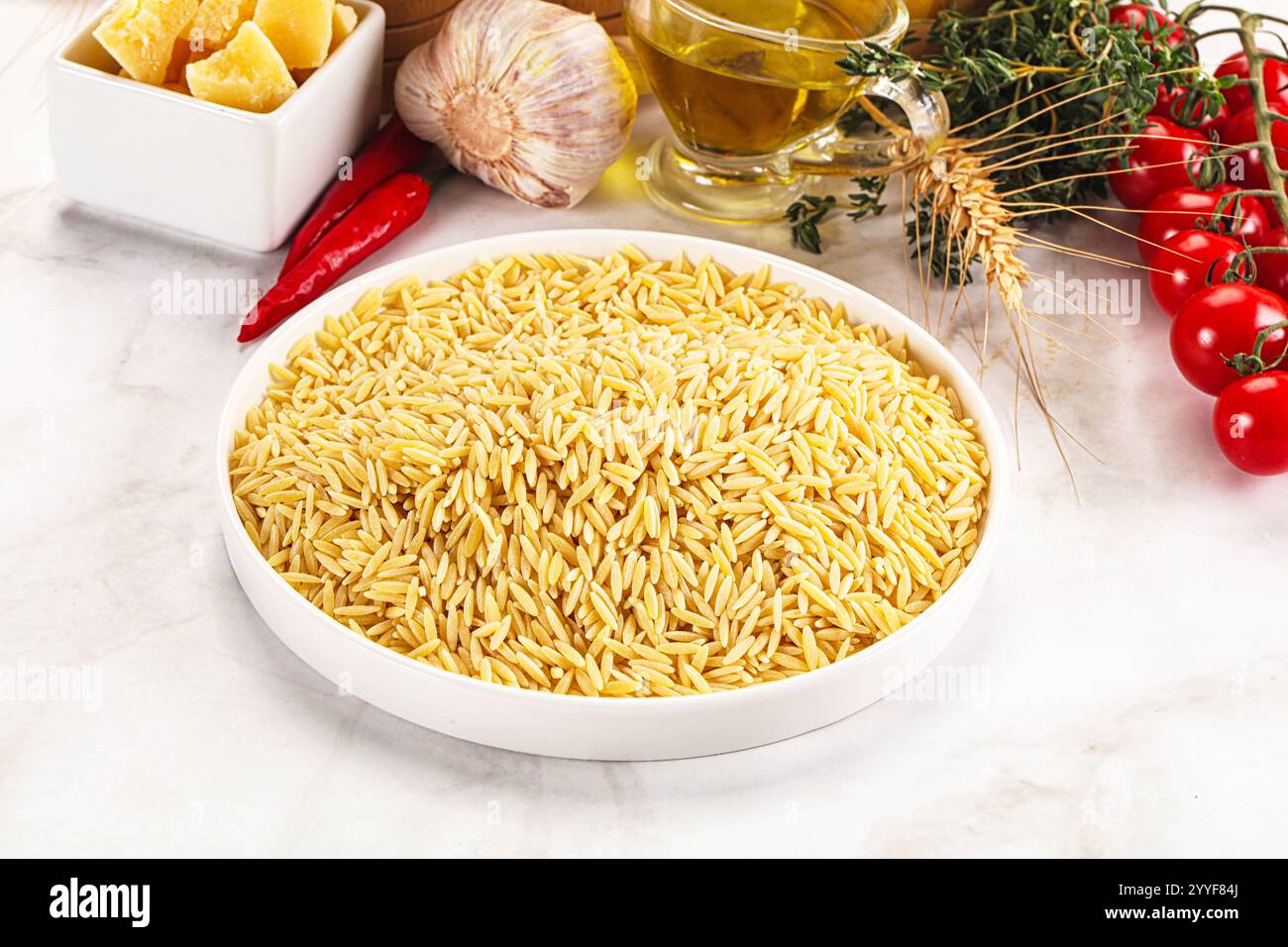 Italian raw dry pasta risoni for cooking Stock Photo - Alamy