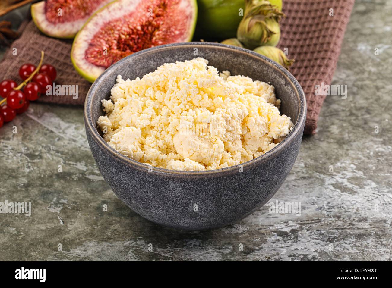 Delicous sheep cottage cheese curd served fig Stock Photo - Alamy