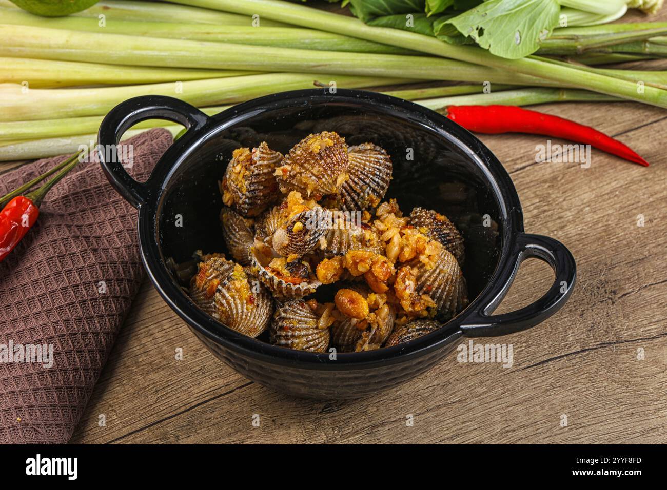 Blood Cockle Fried With Garlic and spices Stock Photo - Alamy
