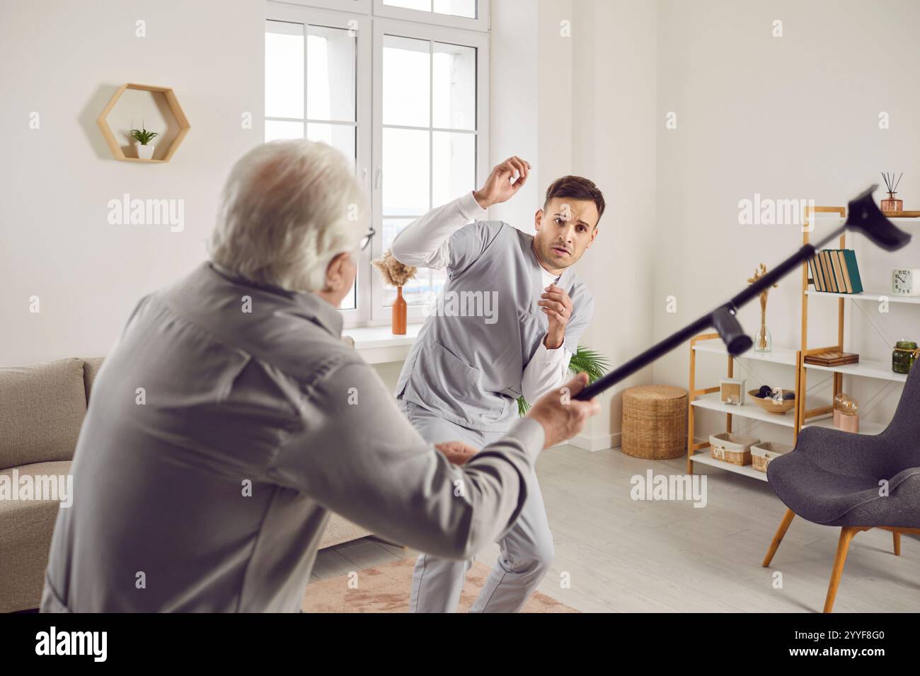 Angry aggressive senior patient at retirement home threatens nurse with ...