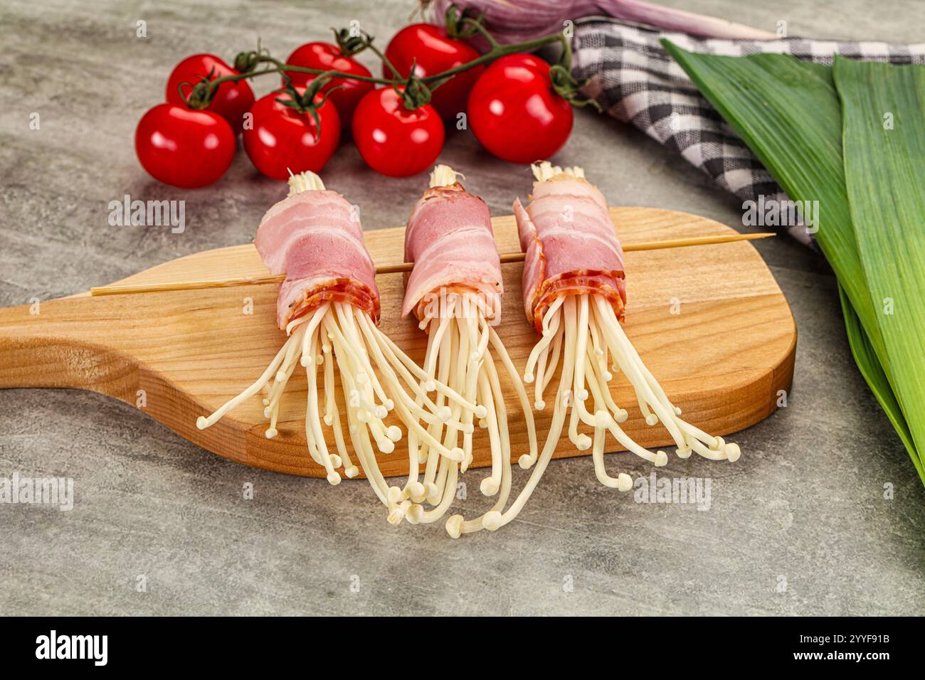 Raw roll with enoki mushroom and bacon Stock Photo - Alamy