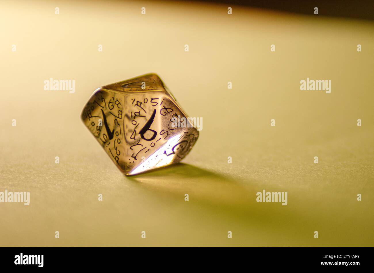 close-up view of a transparent die for board games and role-playing ...