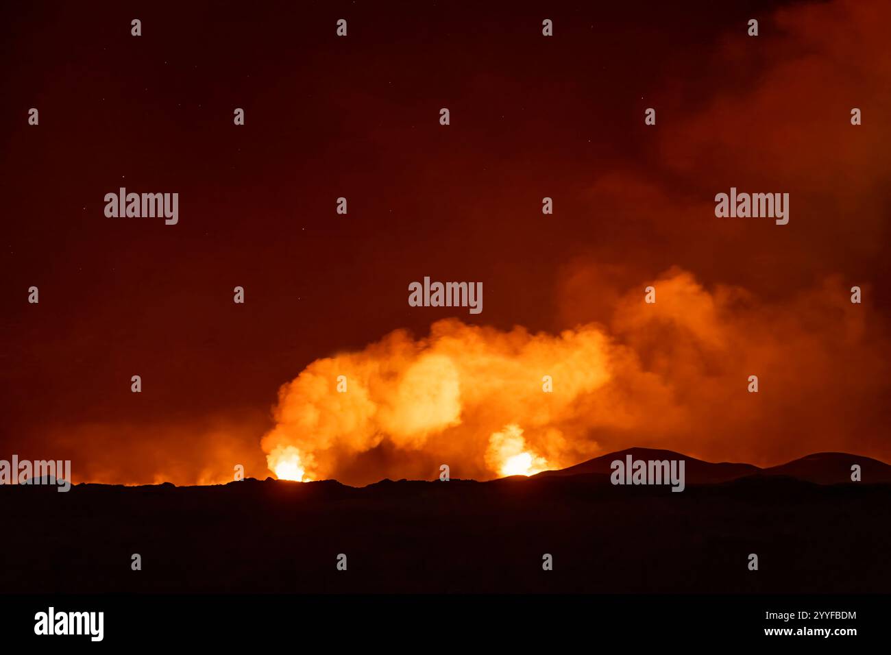 View of volcano eruption showing lava erupting skywards on Reykjanes ...