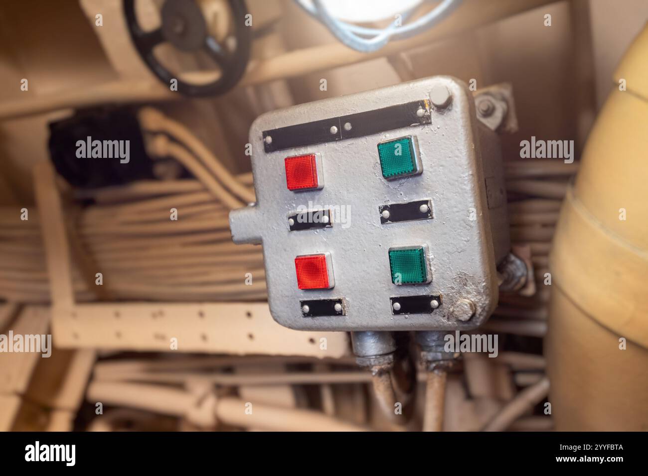 Close up of a control panel featuring red and green buttons inside a ...