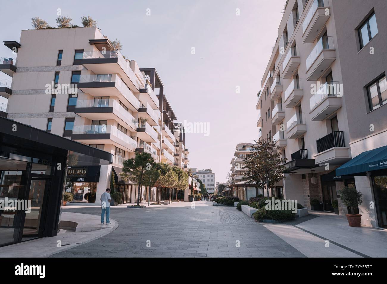 26 October 2024, Tivat, Montenegro: Modern residential buildings line a ...