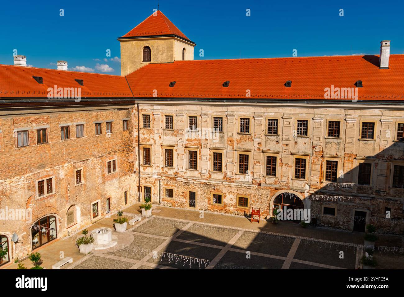 The courtyard of the Thury Castle of Varpalota in Veszprem county Stock ...