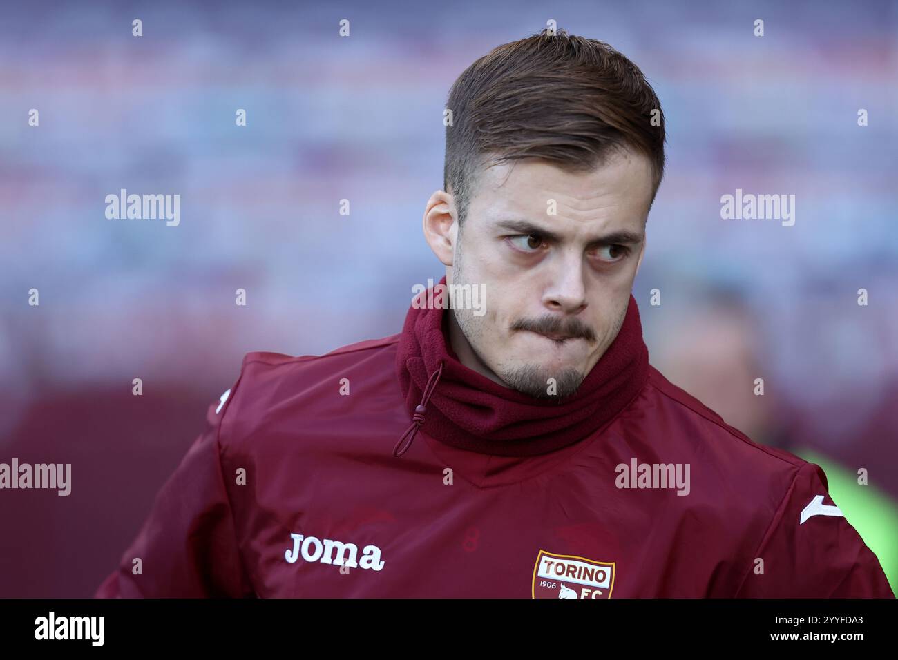 Torino, Italy. 21st Dec, 2024. Ivan Ilic of Torino Fc looks on during the Serie A football match ...