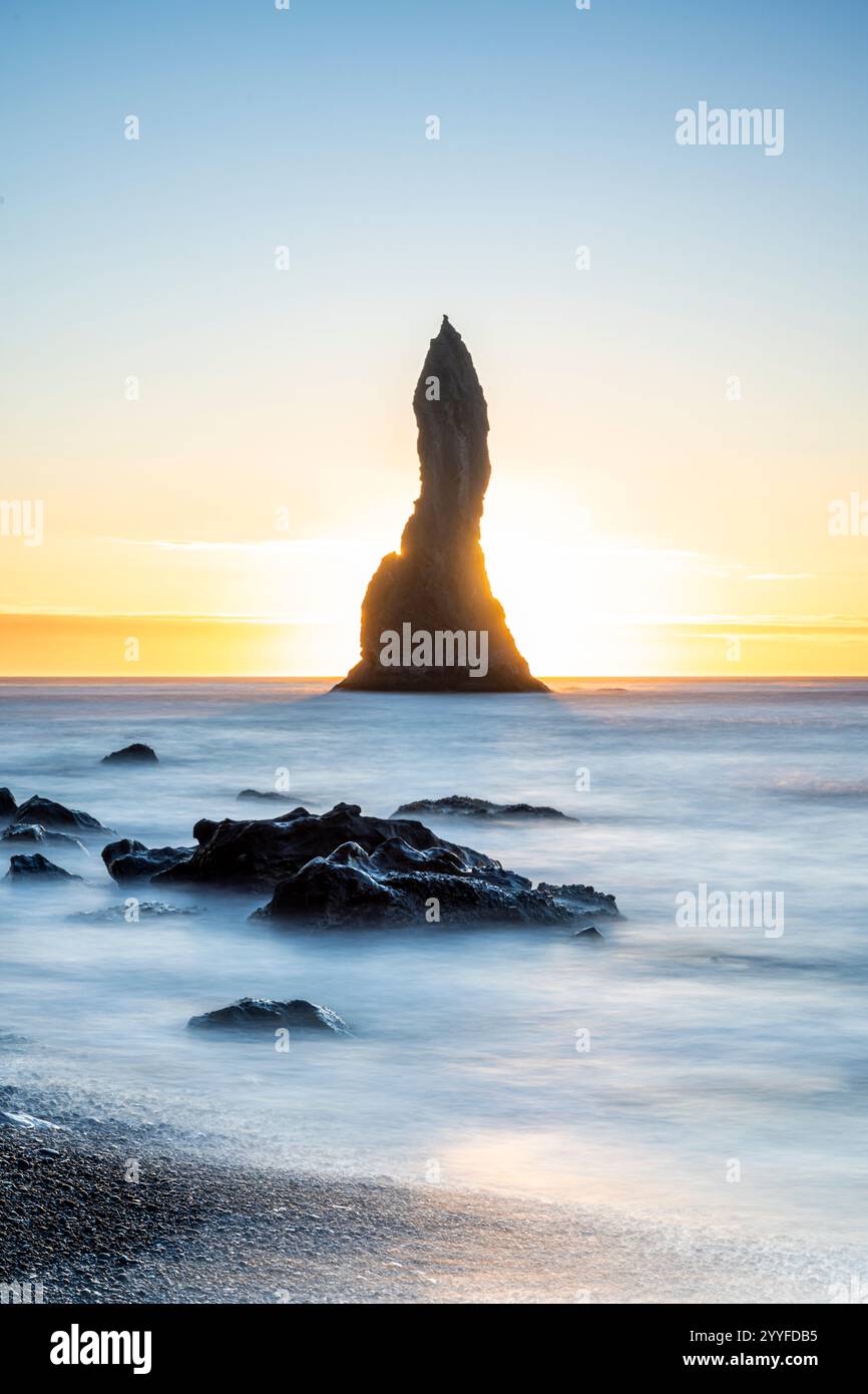 View of Black Sand Beach of Reynisfjara and Reynisdrangar Sea stacks in ...