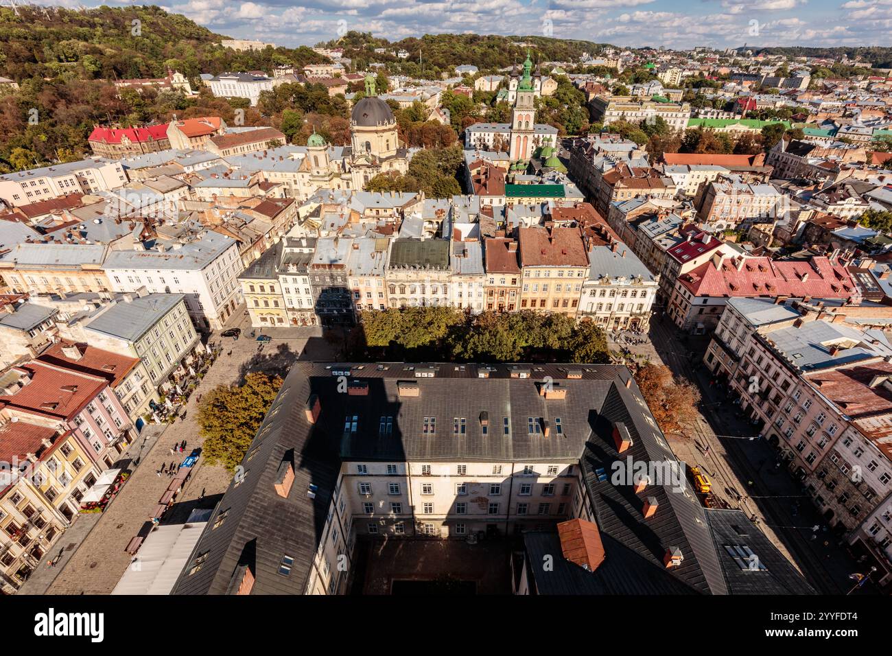 A city view from above with a large building in the center. The ...