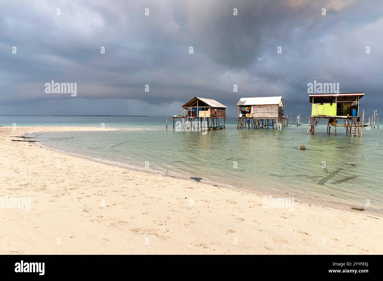 Traditional bajau laut village, houses on stilts on a remote sandbank ...