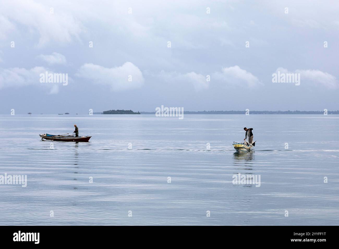 Fishermen from Bajau laut indigenous group fishing in traditional ...