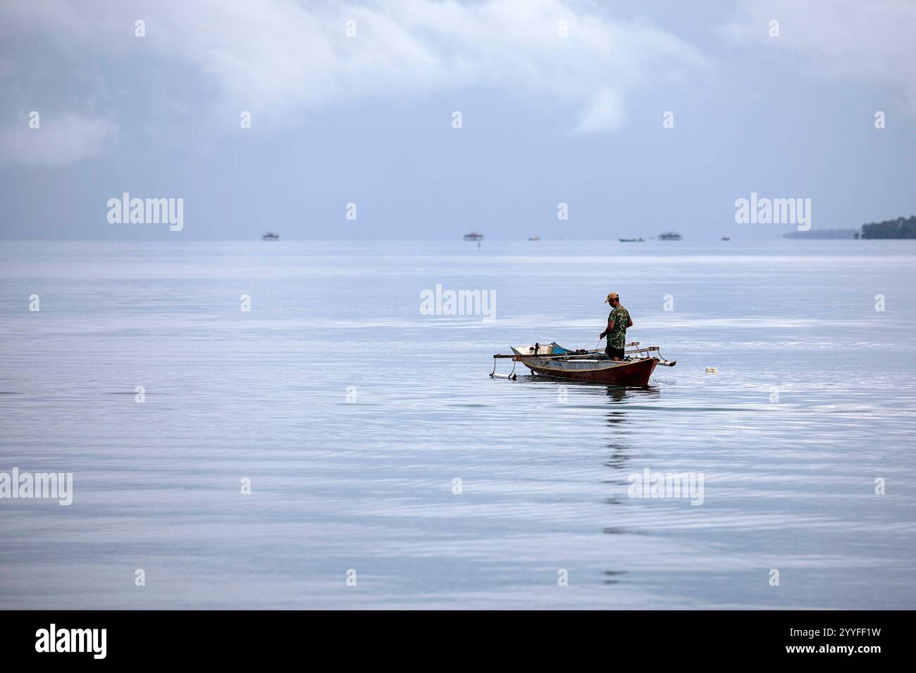 Fishermen from Bajau laut indigenous group fishing in traditional ...