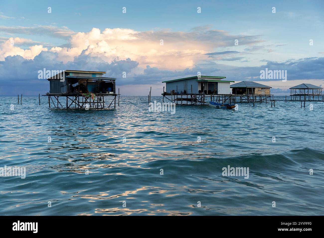 Remote Village of a Bajau laut people in the middle of the sea between ...