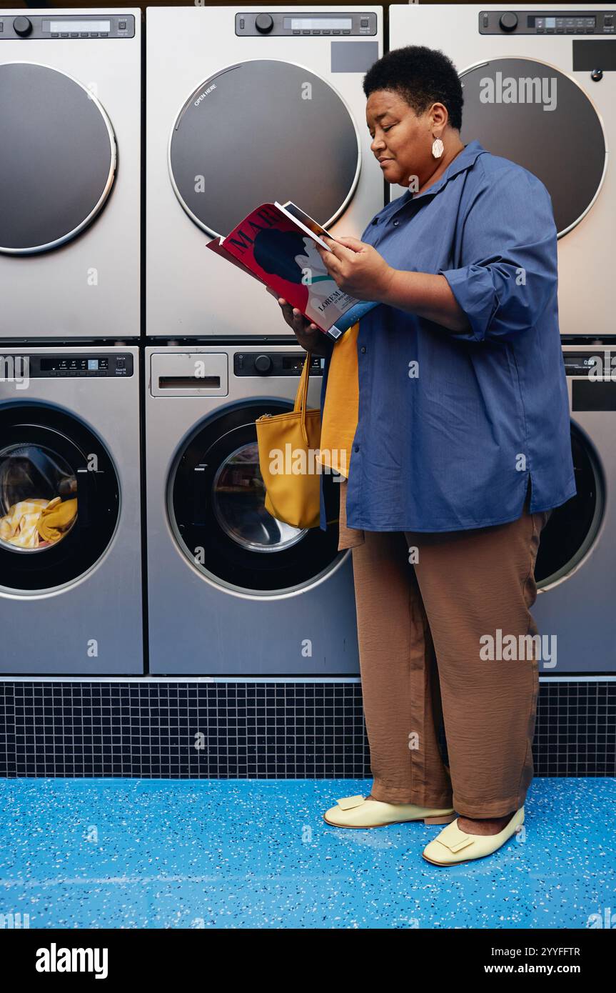 Full length shot of senior African American woman standing at tumbling ...